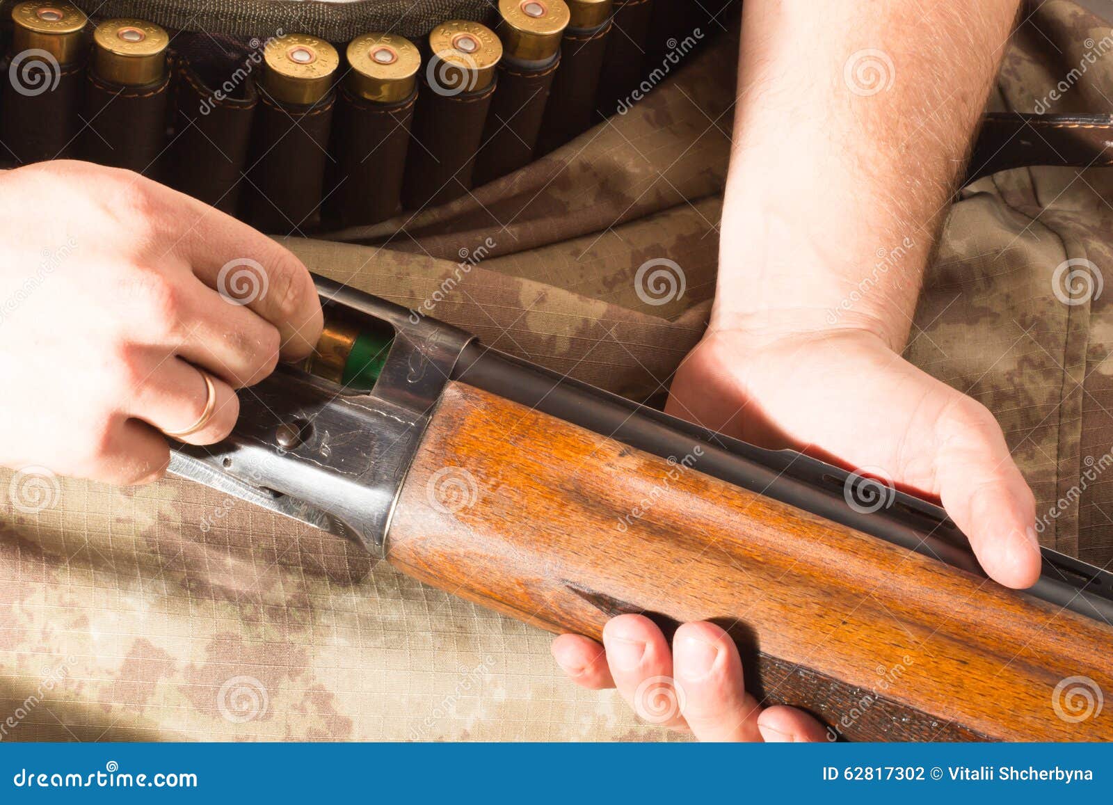 Load 9mm Ammo In The Pistol Clip Close Up. Hands, Bullets, Magazine And ...