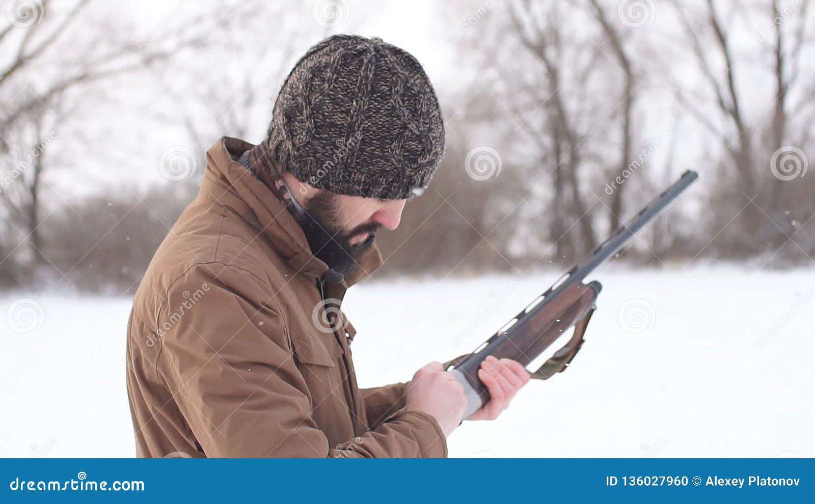 Hunter Loading the Gun before the Hunting Outdoors. Slow Motion Stock ...