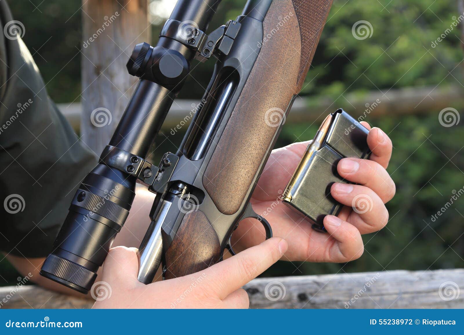 Hunter Loading His Hunting Rifle Gun with Magazine Stock Photo - Image ...