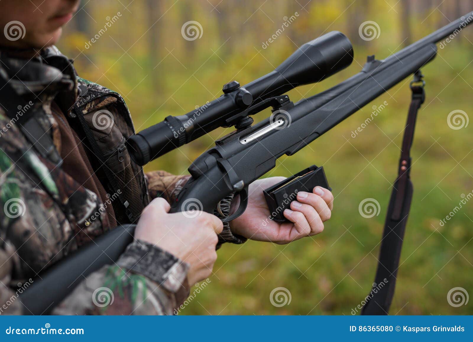 Hunter loading rifle stock photo. Image of close, concept - 86365080