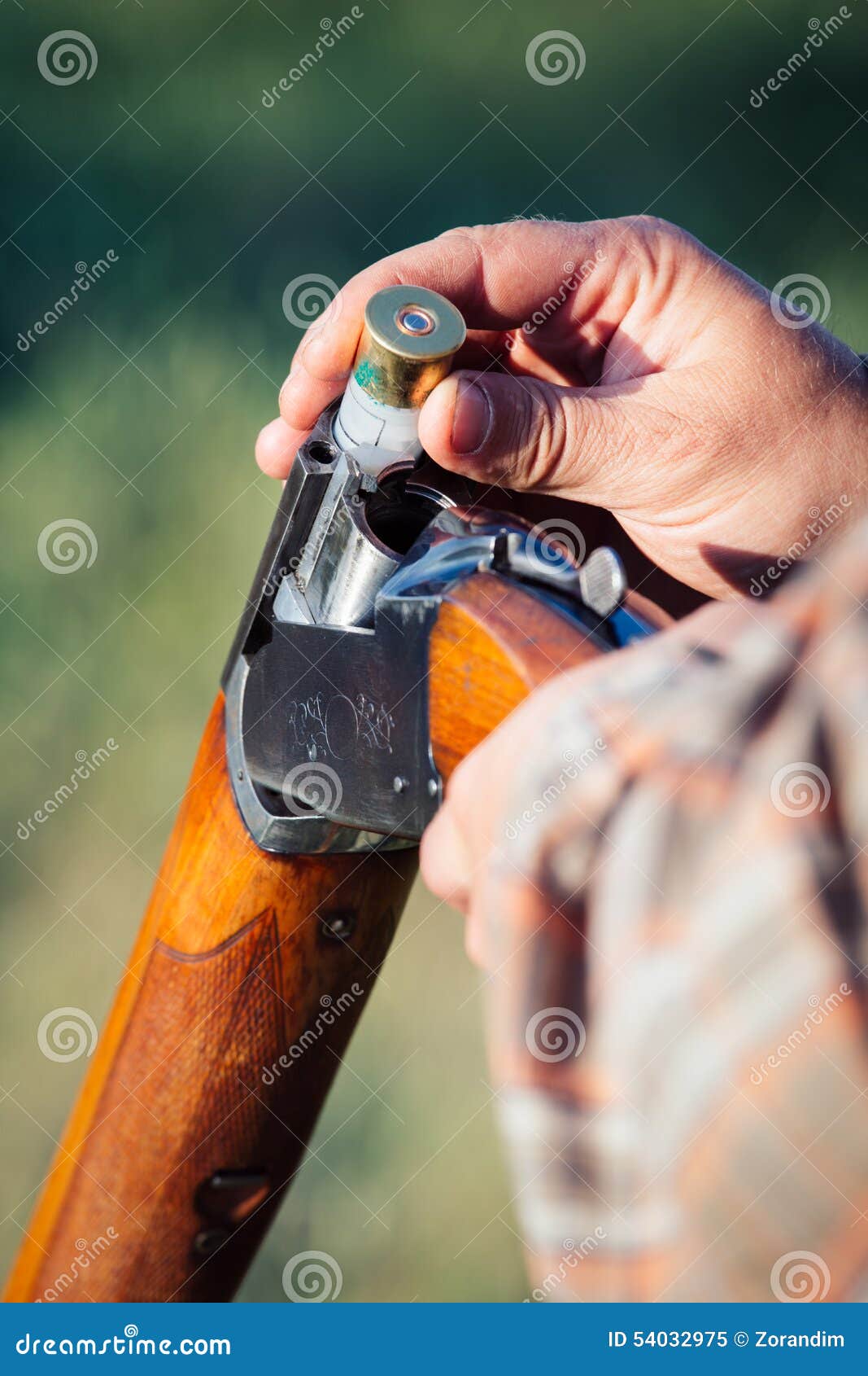 Hunter loading shotgun stock image. Image of animal, field - 54032975