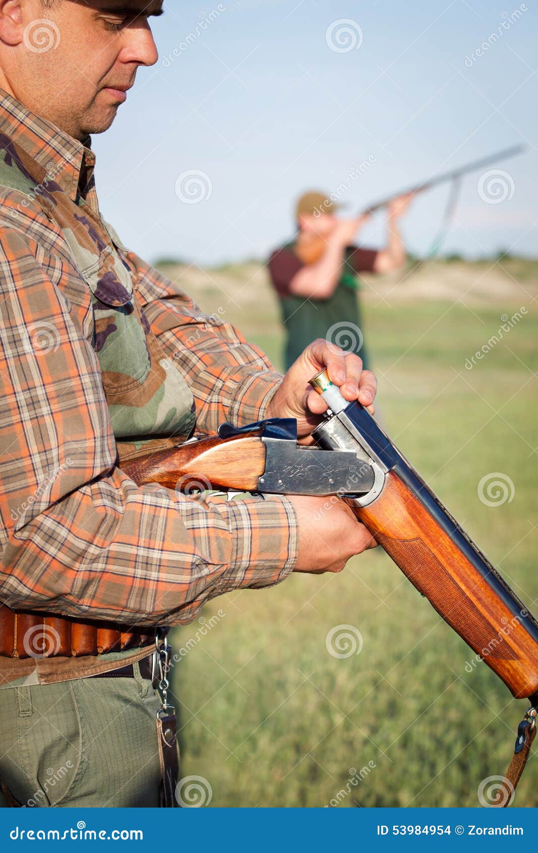 Hunter Loading His Old Russian Double-barreled Over And Under Shotgun ...
