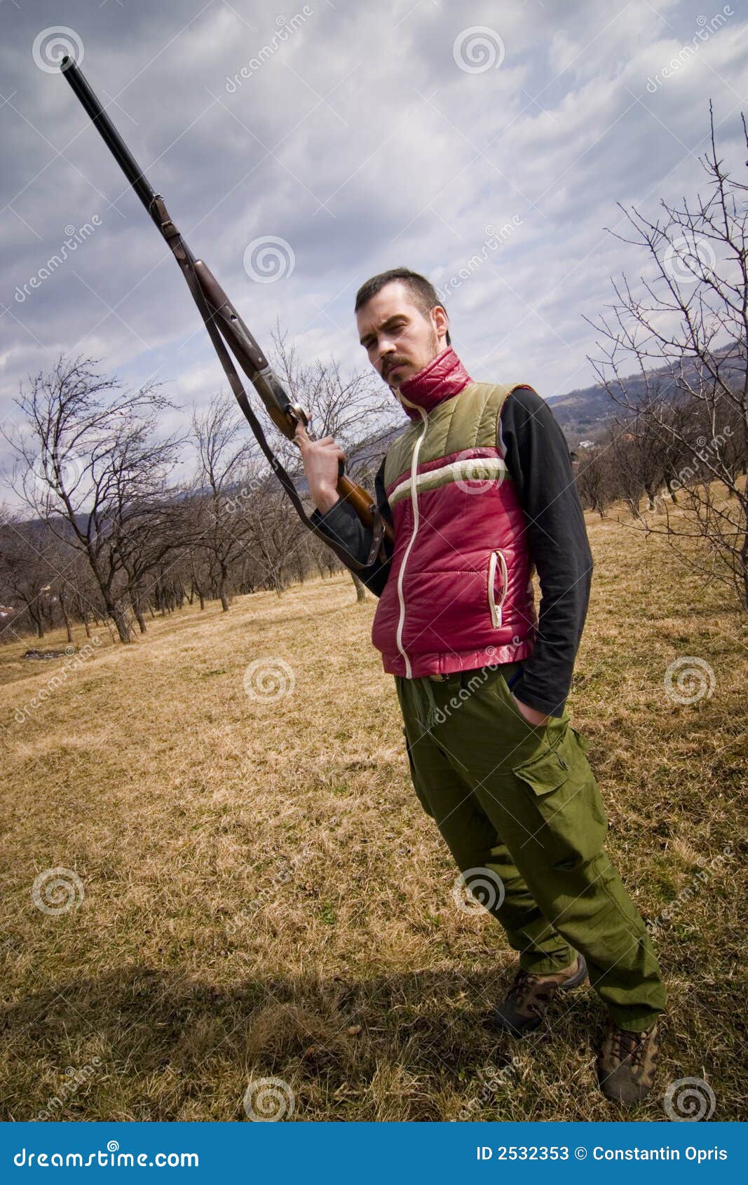 Man holding rifle stock image. Image of menacing, male - 2532353