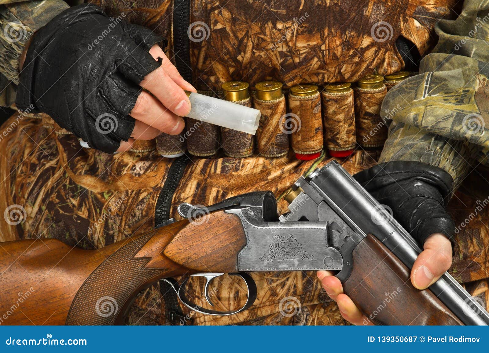 Hunter Pulls Out a Shell Casing from a Shotgun Stock Image - Image of ...