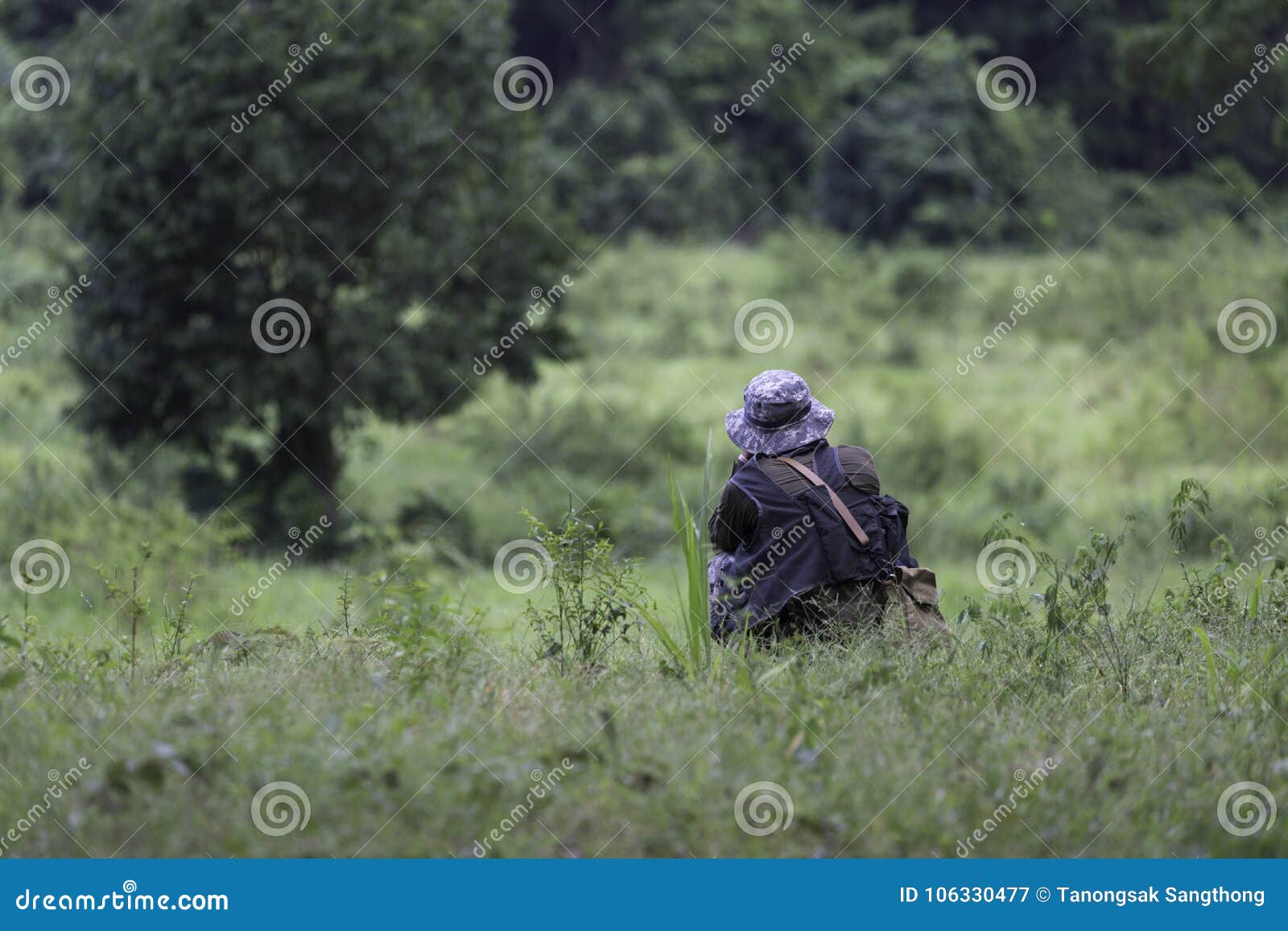 The Hunter while Resting and Looking for Animal Stock Image - Image of ...