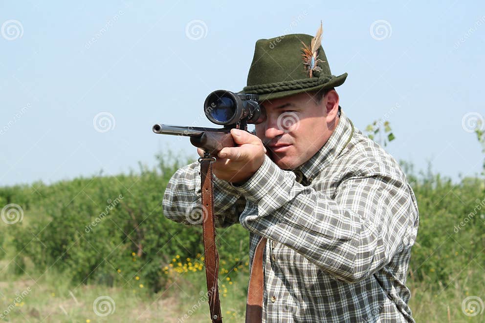 Hunter with rifle stock image. Image of equipment, male - 19672853