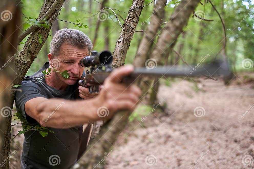 Hunter with rifle stock image. Image of ranger, nature - 155349387