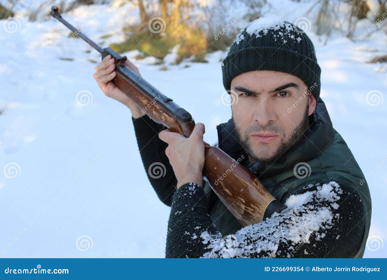 Hunter Shooting in the Snow Stock Photo - Image of canadian, camouflage ...