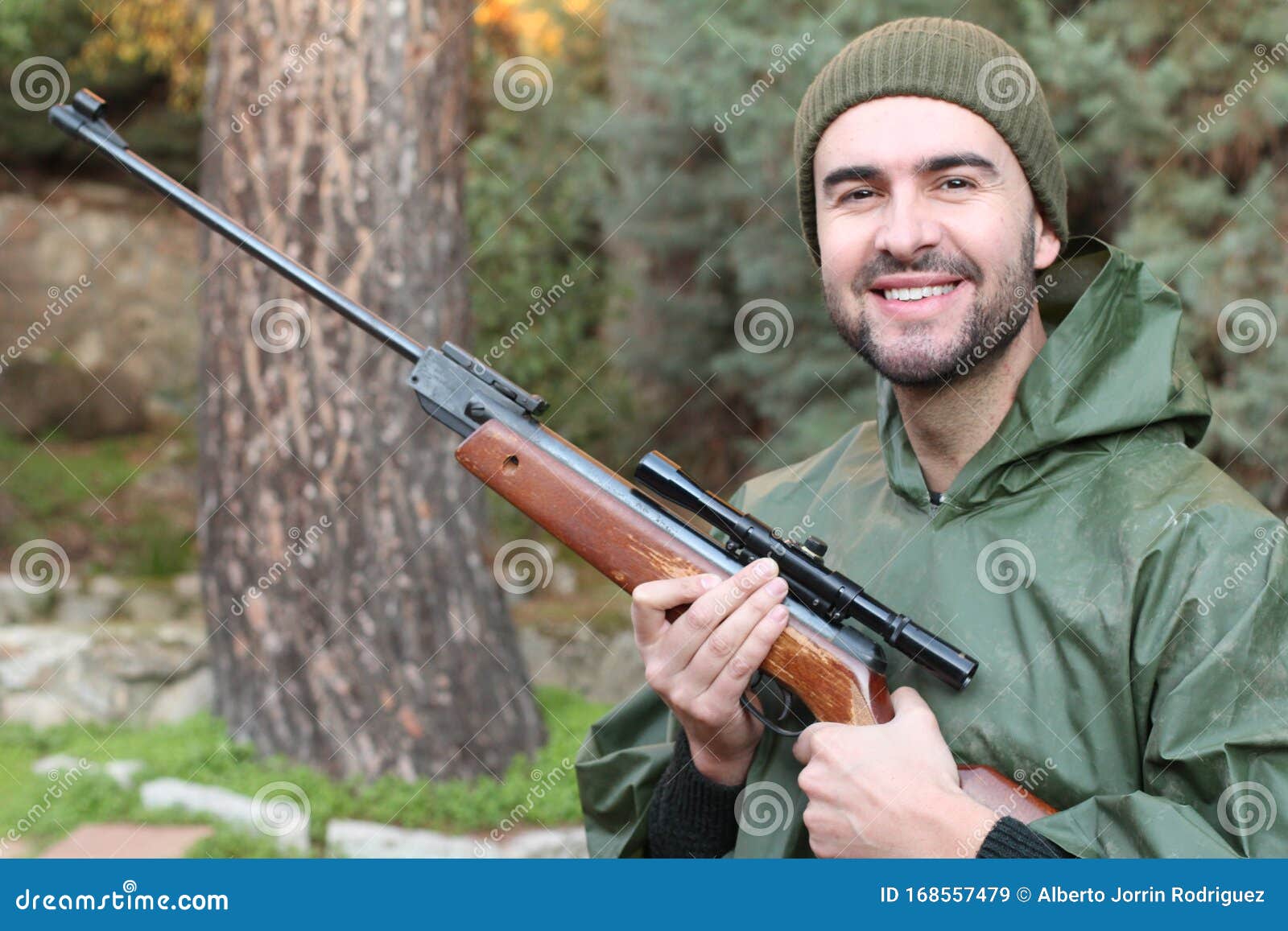 Hunter Smiling in the Woods Stock Image - Image of hunter, aiming ...