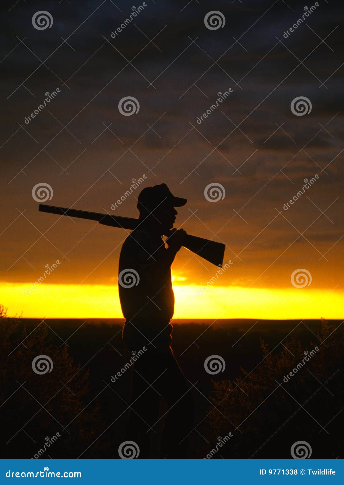 Hunter in Sunrise stock photo. Image of weapon, hunting - 9771338