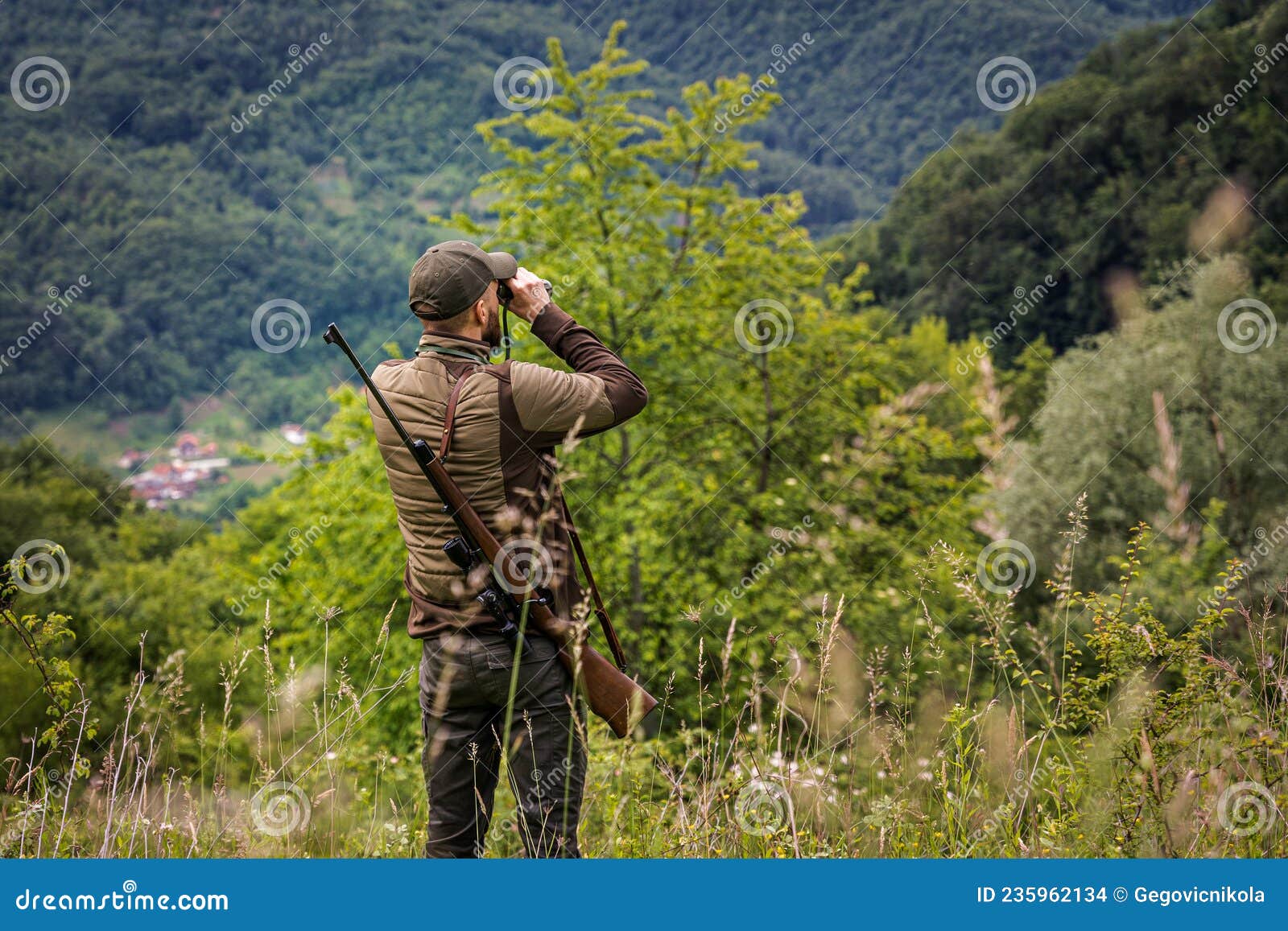Hunter Using Binoculars To Search for Prey Stock Photo - Image of ...