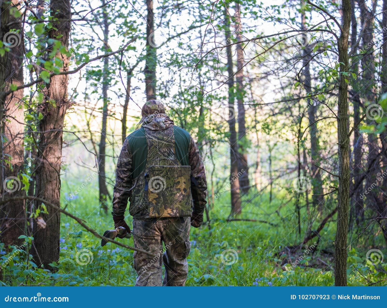 A hunter walking with gun editorial stock photo. Image of away - 102707923