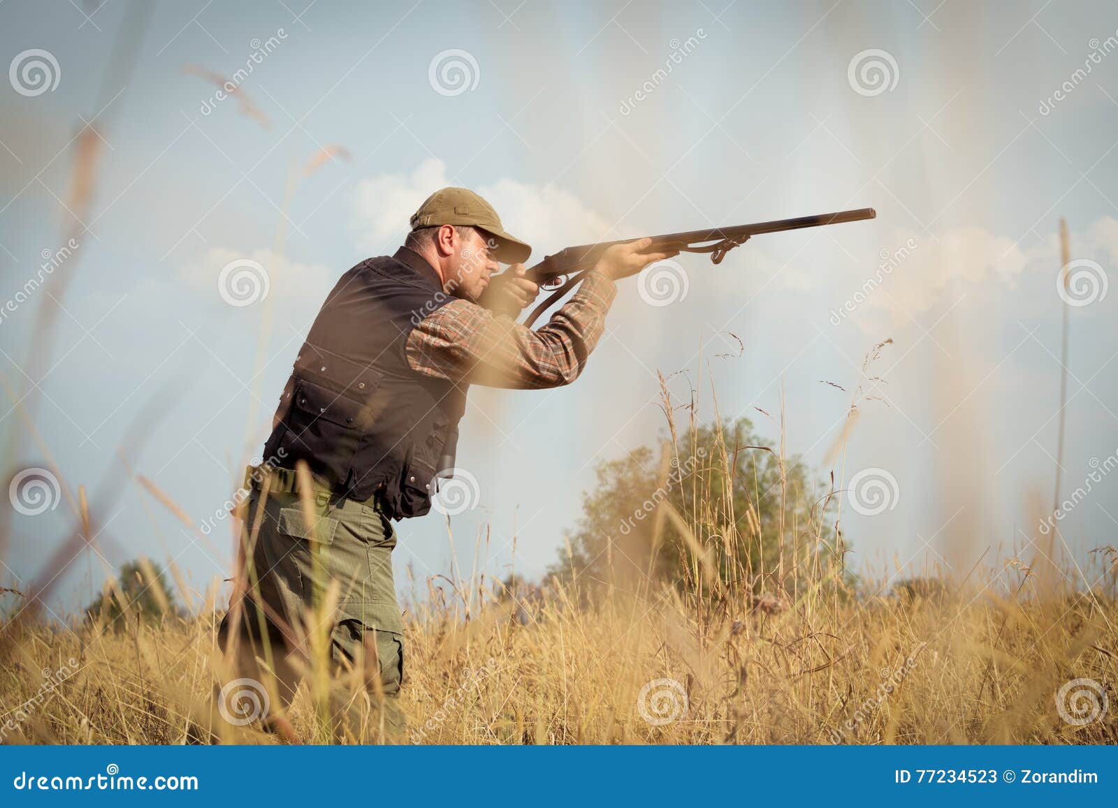 Hunter wild duck hunting stock image. Image of adventure - 77234523
