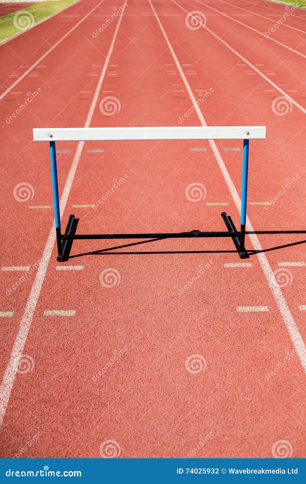 Hurdle on running track stock photo. Image of stadium - 74025932