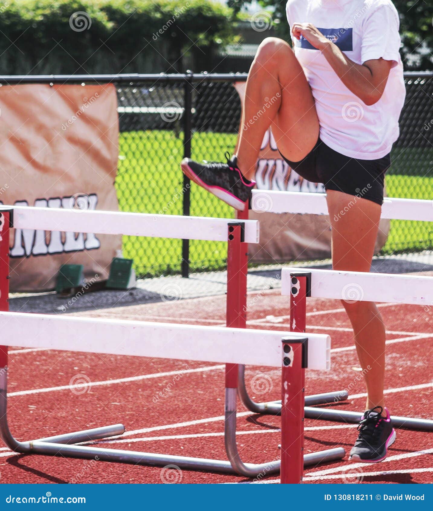 Hurdler Practicing A-skip Drill Over Hurdles Stock Image ... Hurdler Practicing A-skip Drill Over Hurdles Stock Image ...