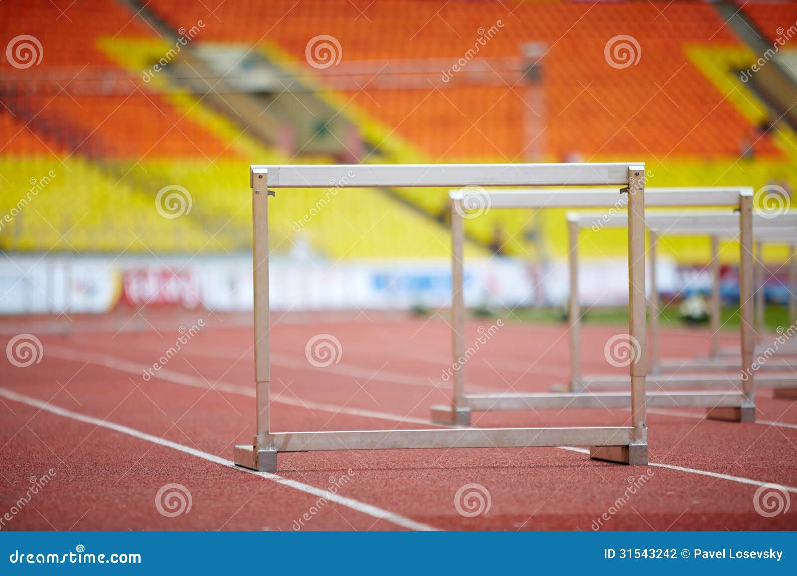 Hurdles on race tracks stock photo. Image of fitness - 31543242