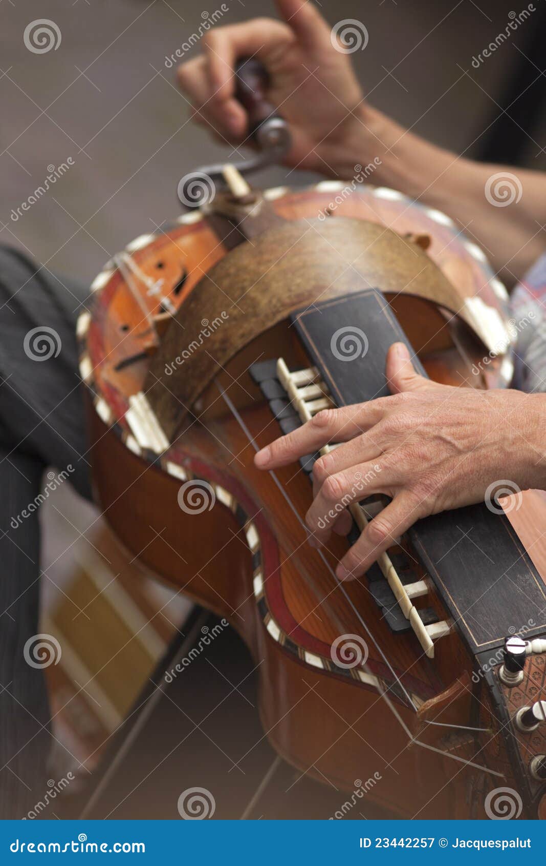 Hurdy-gurdy stock image. Image of gurdy, playing, instrument - 23442257