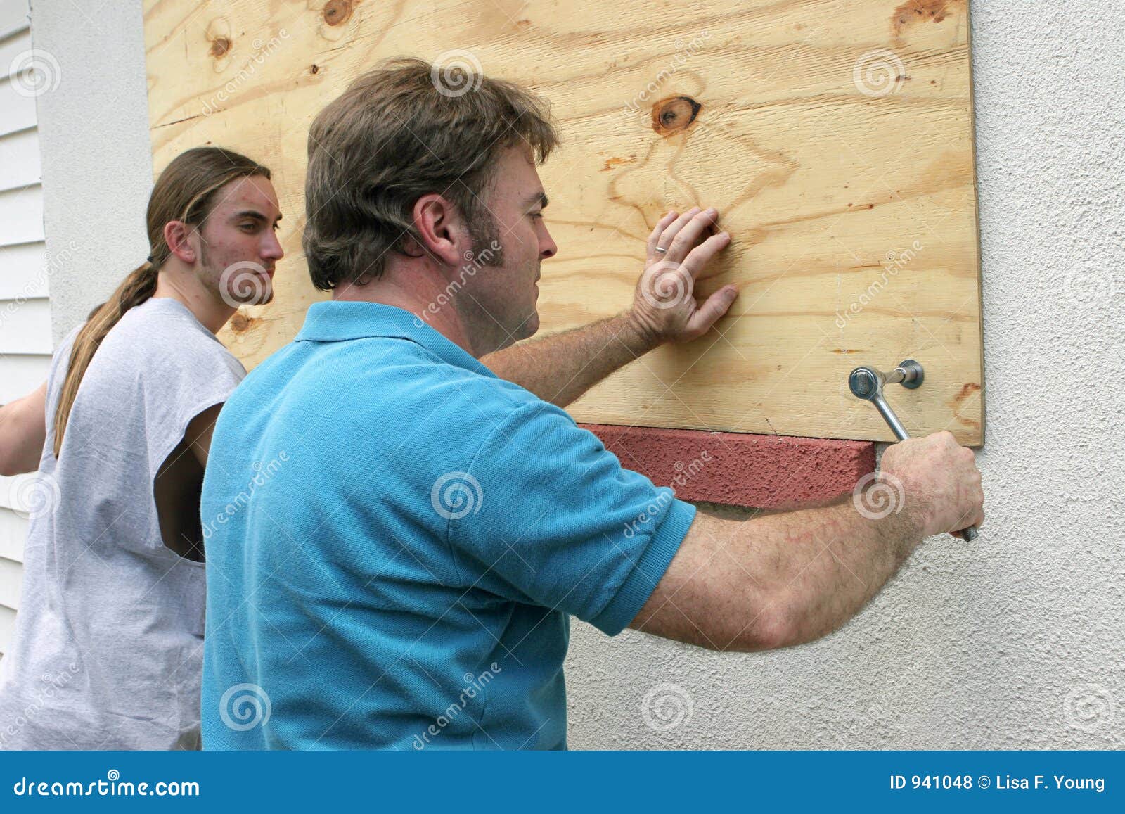 Hurricane Preparedness - Teamwork Stock Photo - Image of home, safe: 941048
