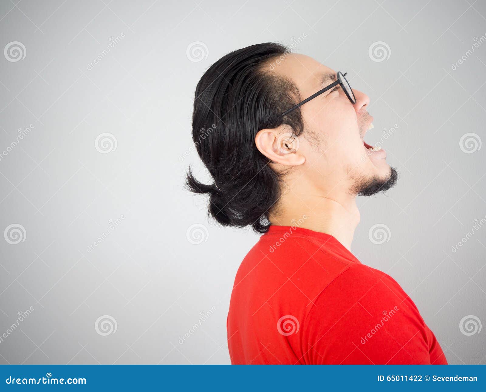 Hurted Asian man. stock photo. Image of background, strain - 65011422