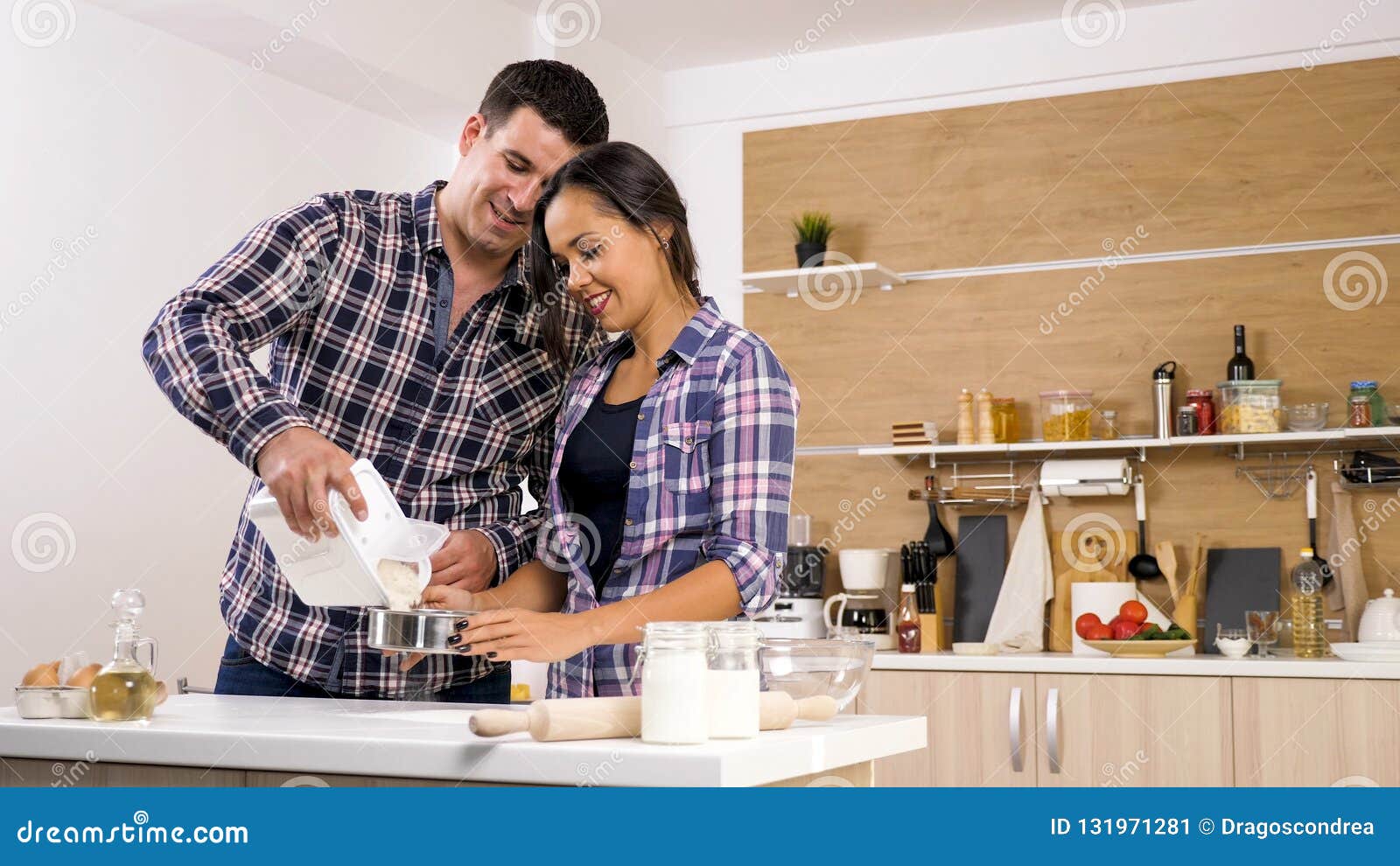Husband Helping His Beautiful Wife with Dinner Stock Image - Image of ...