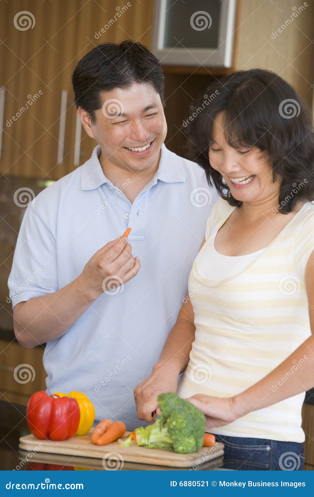 Husband and Wife Preparing Meal Stock Image - Image of middle, casual ...
