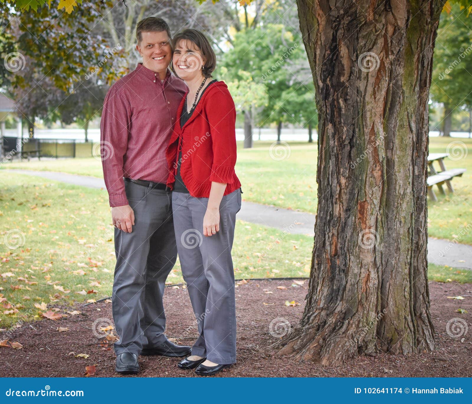 Husband and Wife Under a Tree Stock Photo - Image of middle, outdoors ...