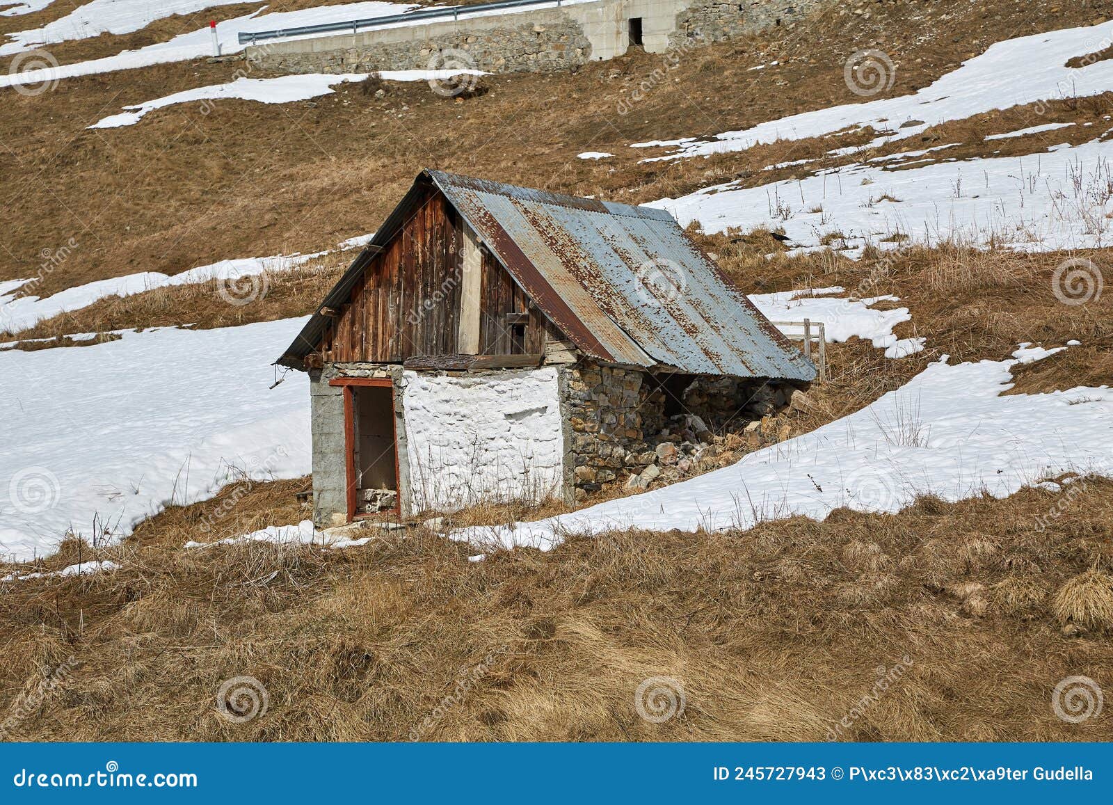Hut on an Alpine slope stock image. Image of small, mountain - 245727943