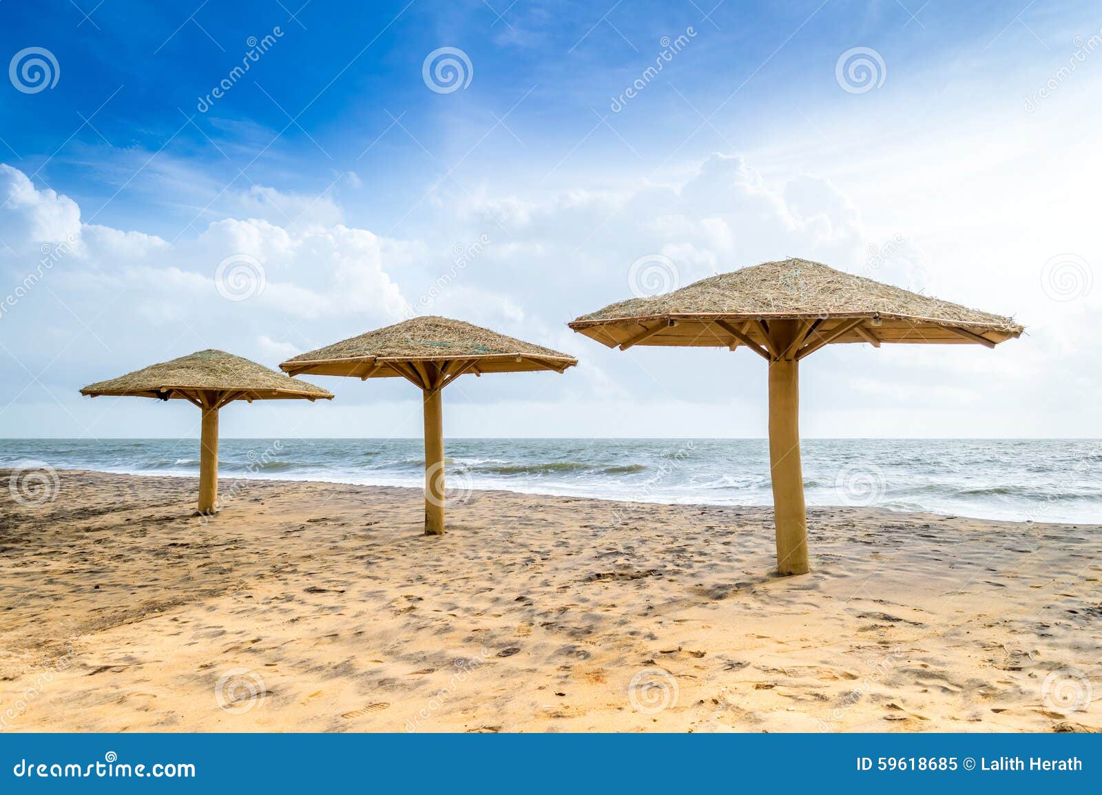 Huts on beach stock image. Image of bodies, beautiful - 59618685