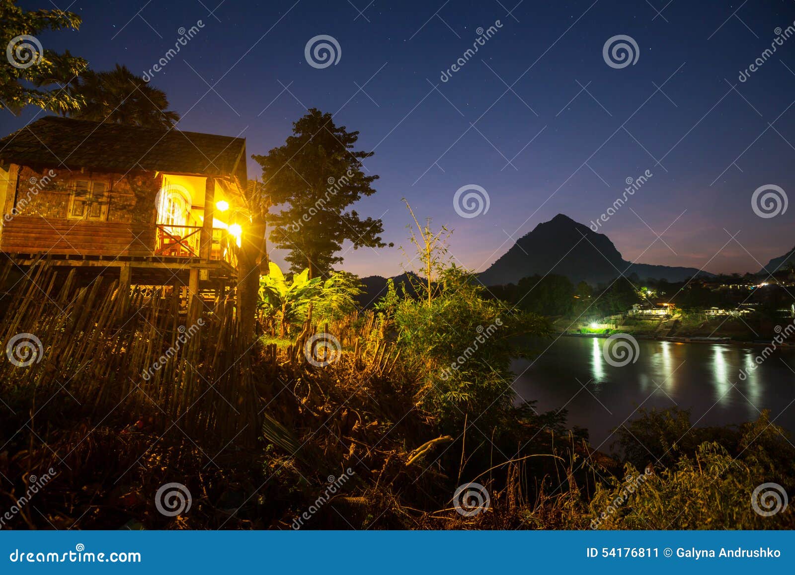 Huts at night stock image. Image of night, tropical, house - 54176811
