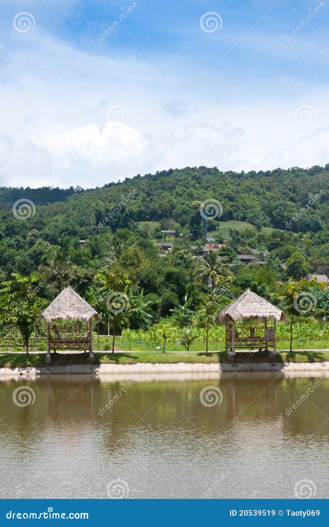 The huts in the river stock image. Image of landscape - 20539519