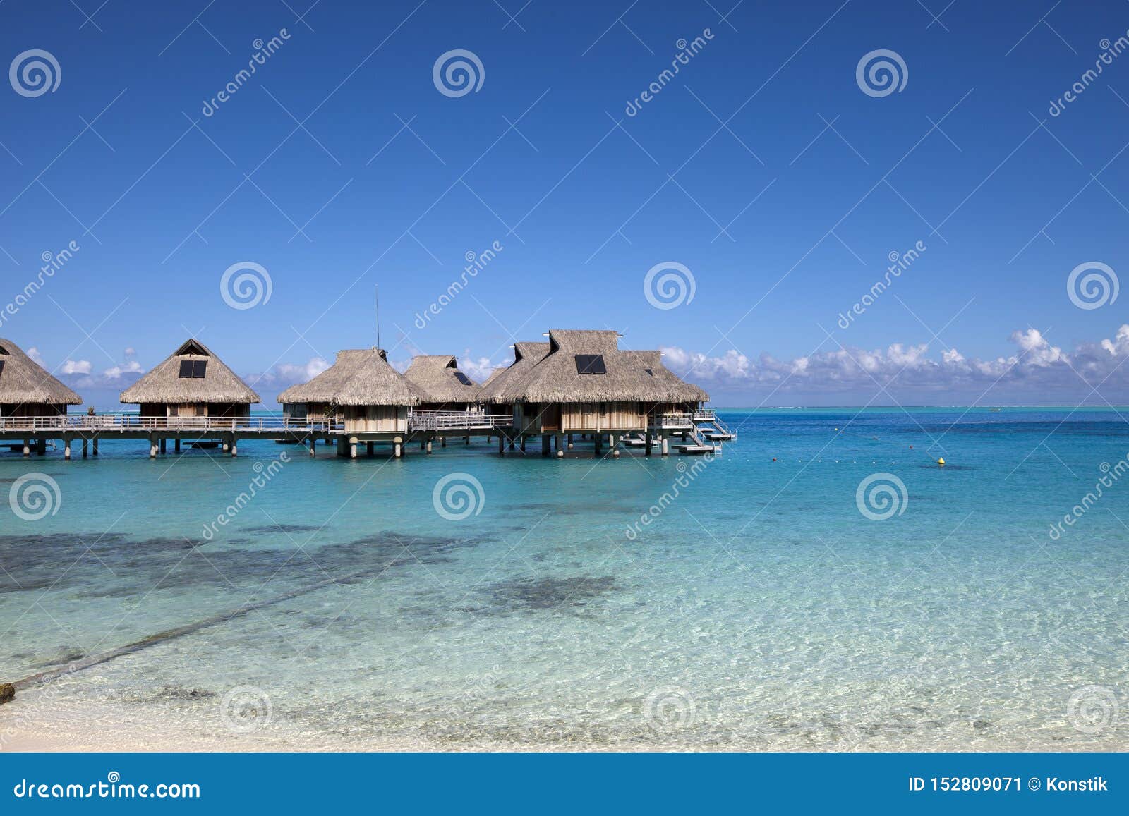 Huts on water in the sea stock image. Image of huts - 152809071