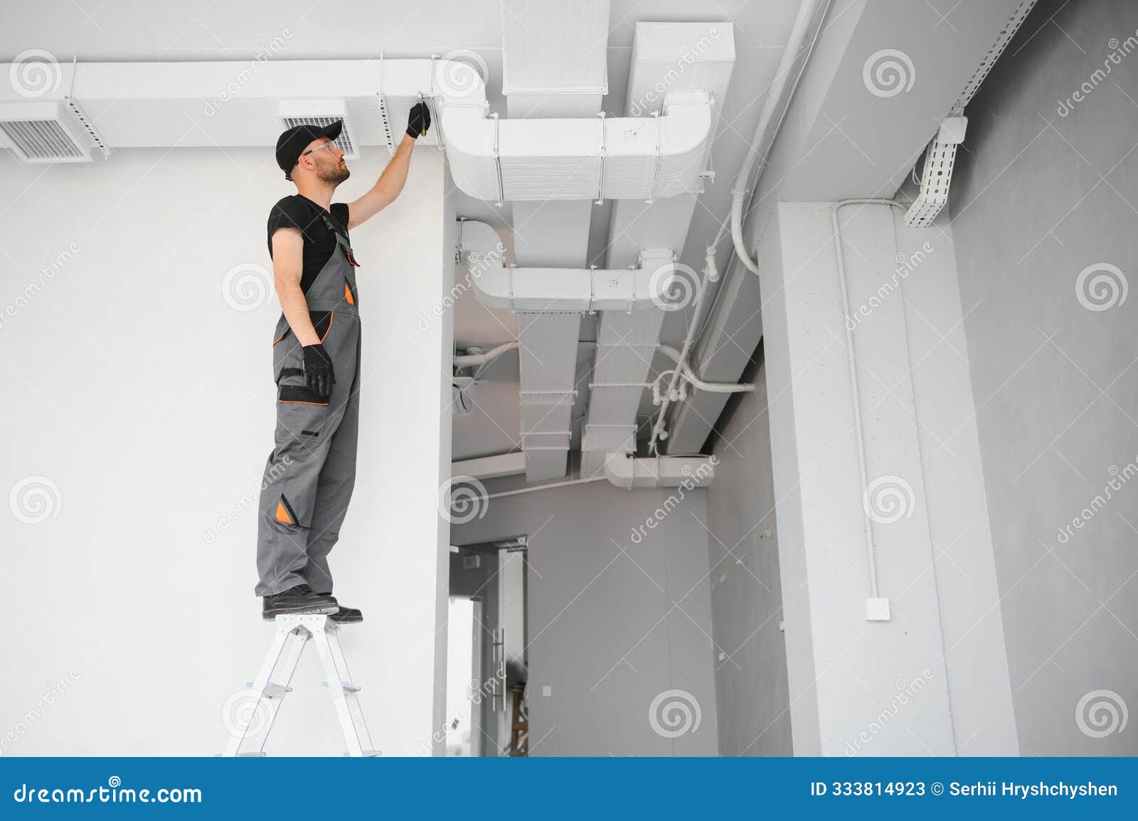 Hvac Services, Worker Install Ducted Pipe System for Ventilation and ...