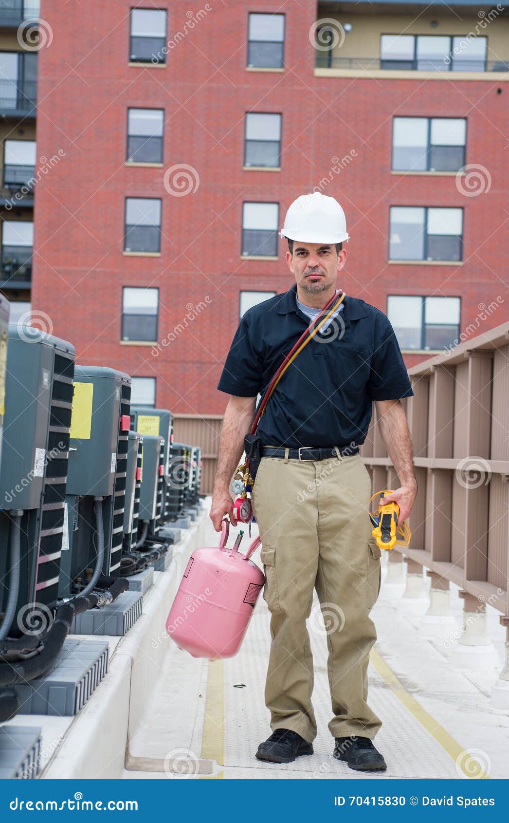 HVAC Tech Pose stock photo. Image of conditioner, charge - 70415830