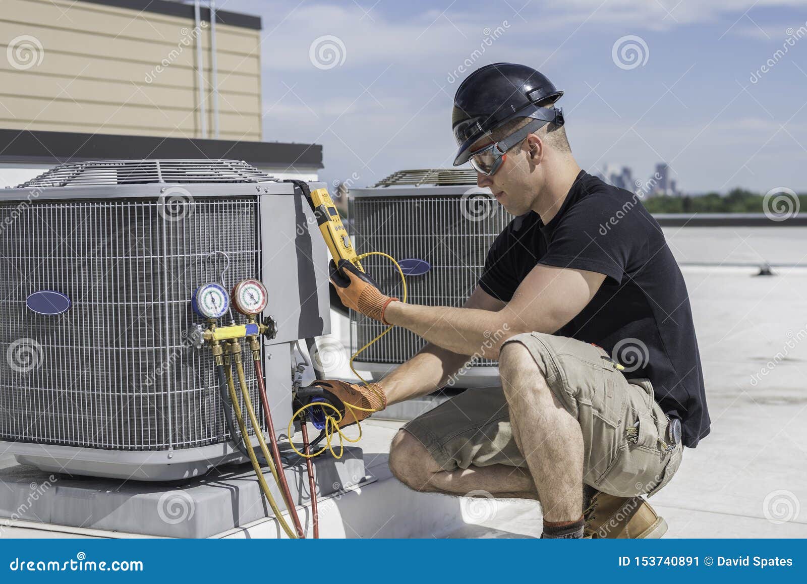 Hvac Tech Looking at a Multimeter Stock Image - Image of cooling ...