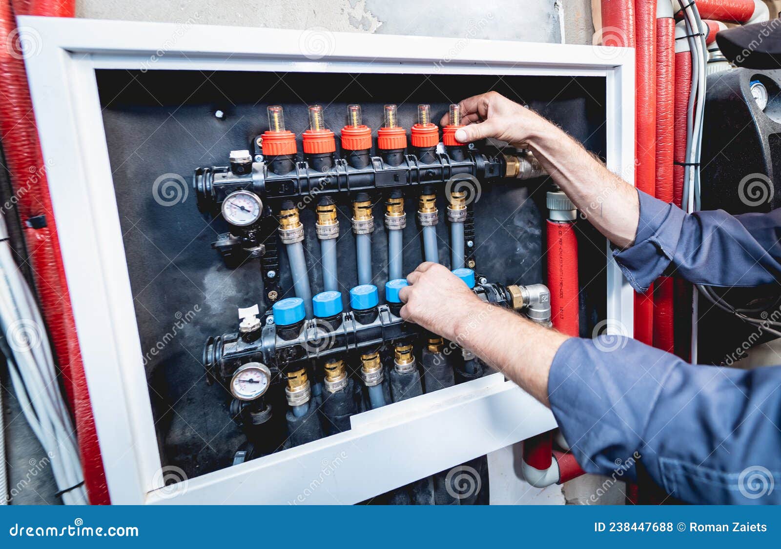 HVAC Technician Servicing Home Heating and Cooling System Stock Photo ...