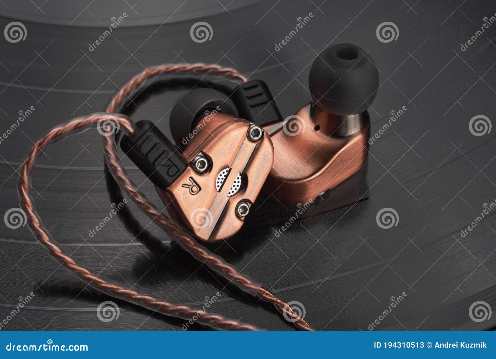Hybrid Ear-buds on the LP Vinyl Record Stock Image - Image of copper ...