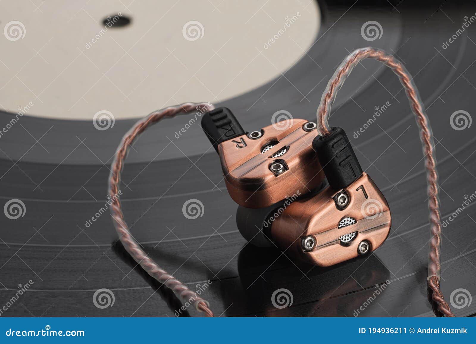 Hybrid Ear-buds on the LP Vinyl Record Stock Image - Image of armature ...