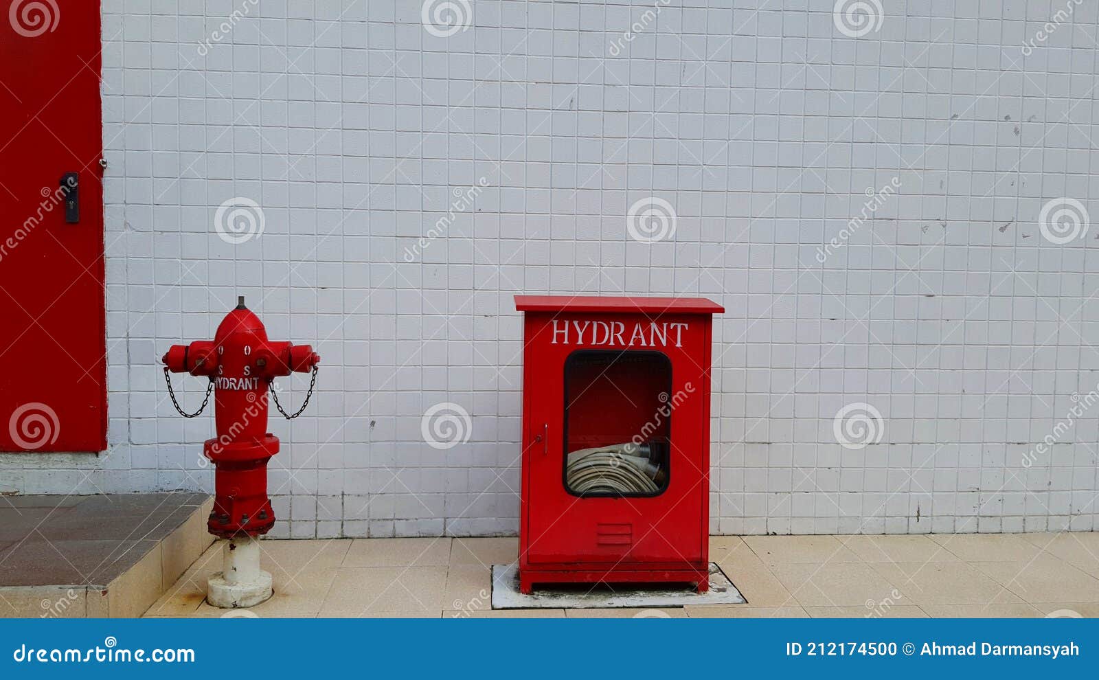 Hydrant Equipments beside White Wall Stock Photo - Image of design ...