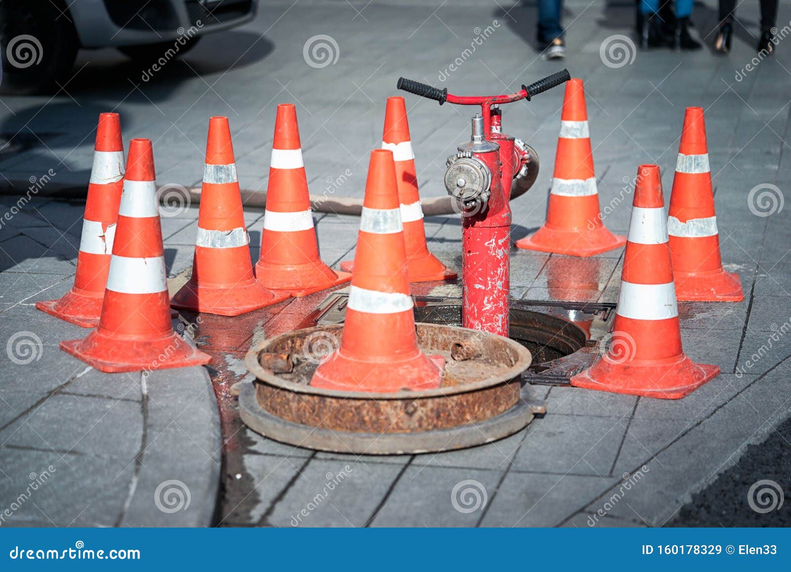 Hydrant Surrounded by Cones Stock Image - Image of barrier, safety ...