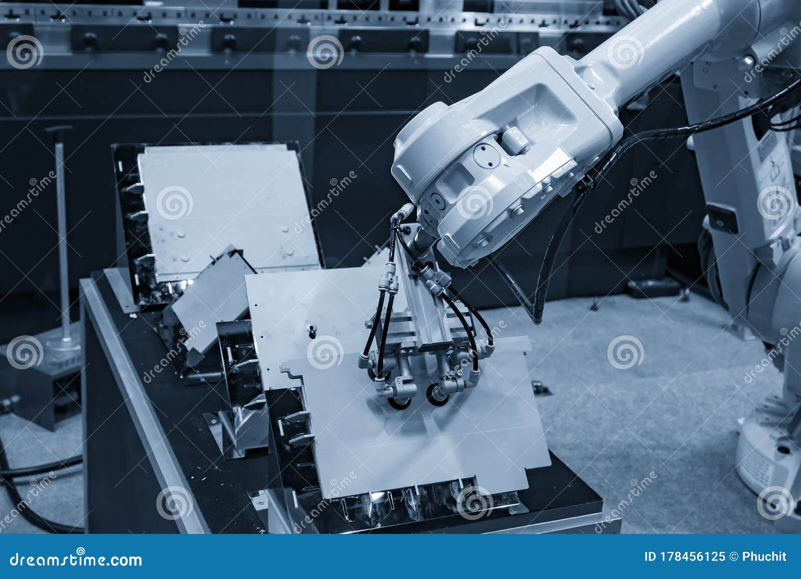 Robotic Arm Handling The Metal Machined Shaft Parts Polishing Between ...