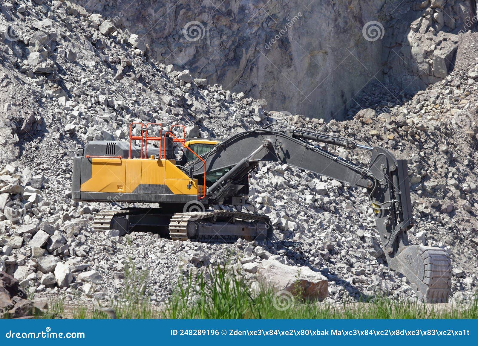 Hydraulic Crawler Excavator in Stone Quarry at Work Stock Photo - Image ...