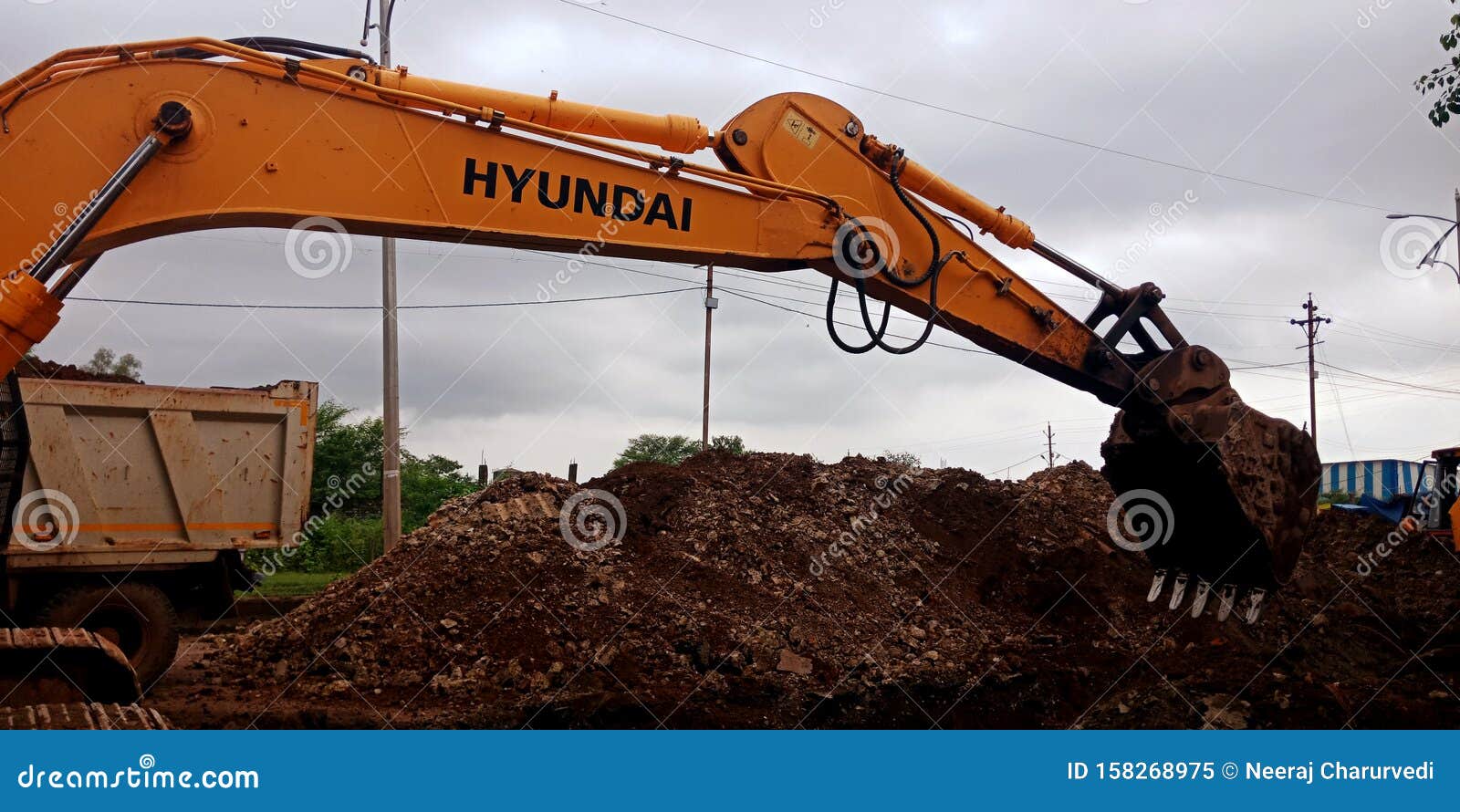 Hydraulic Digging Machine Working on Road Construction Editorial Image ...