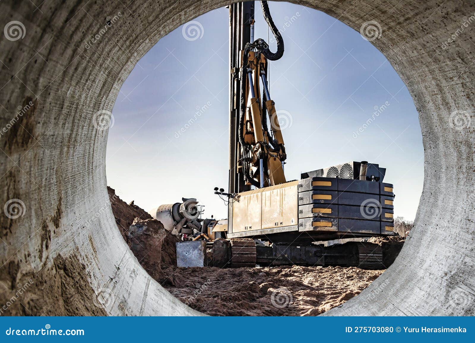 Hydraulic Drilling Machine in Excavation at the Construction Site ...