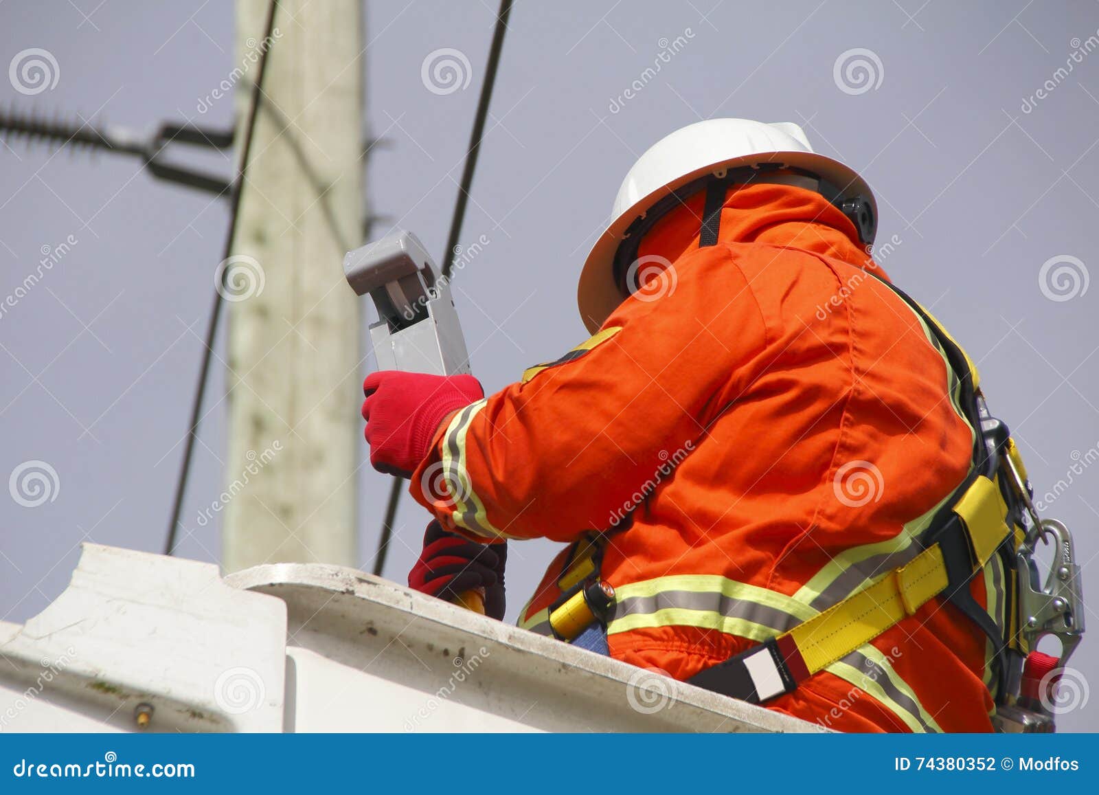 Hydro Electric Linesman Checks Voltage Reader Stock Photo - Image of ...