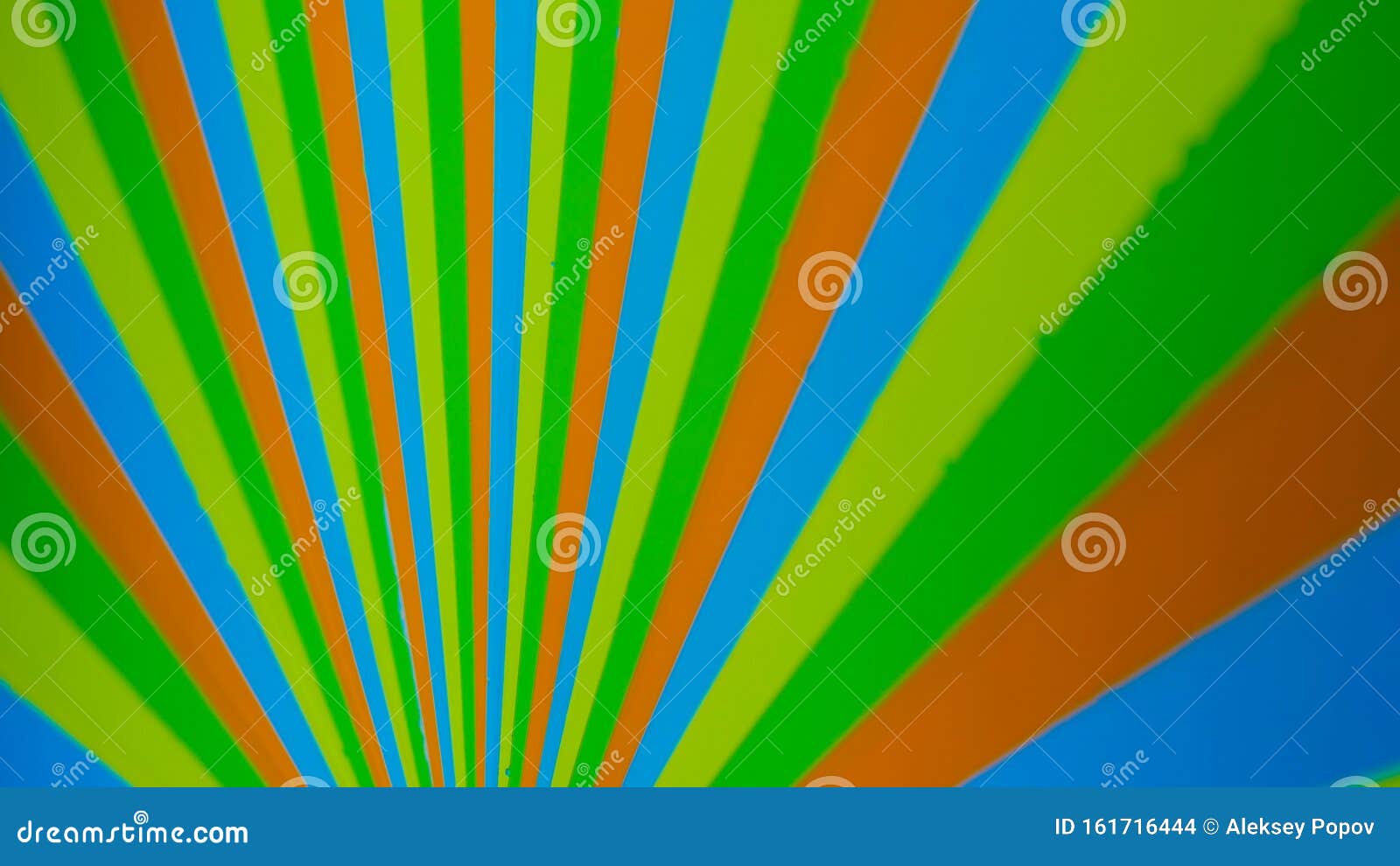 Hypnotic spinning pinwheel stock photo. Image of colorful - 161716444