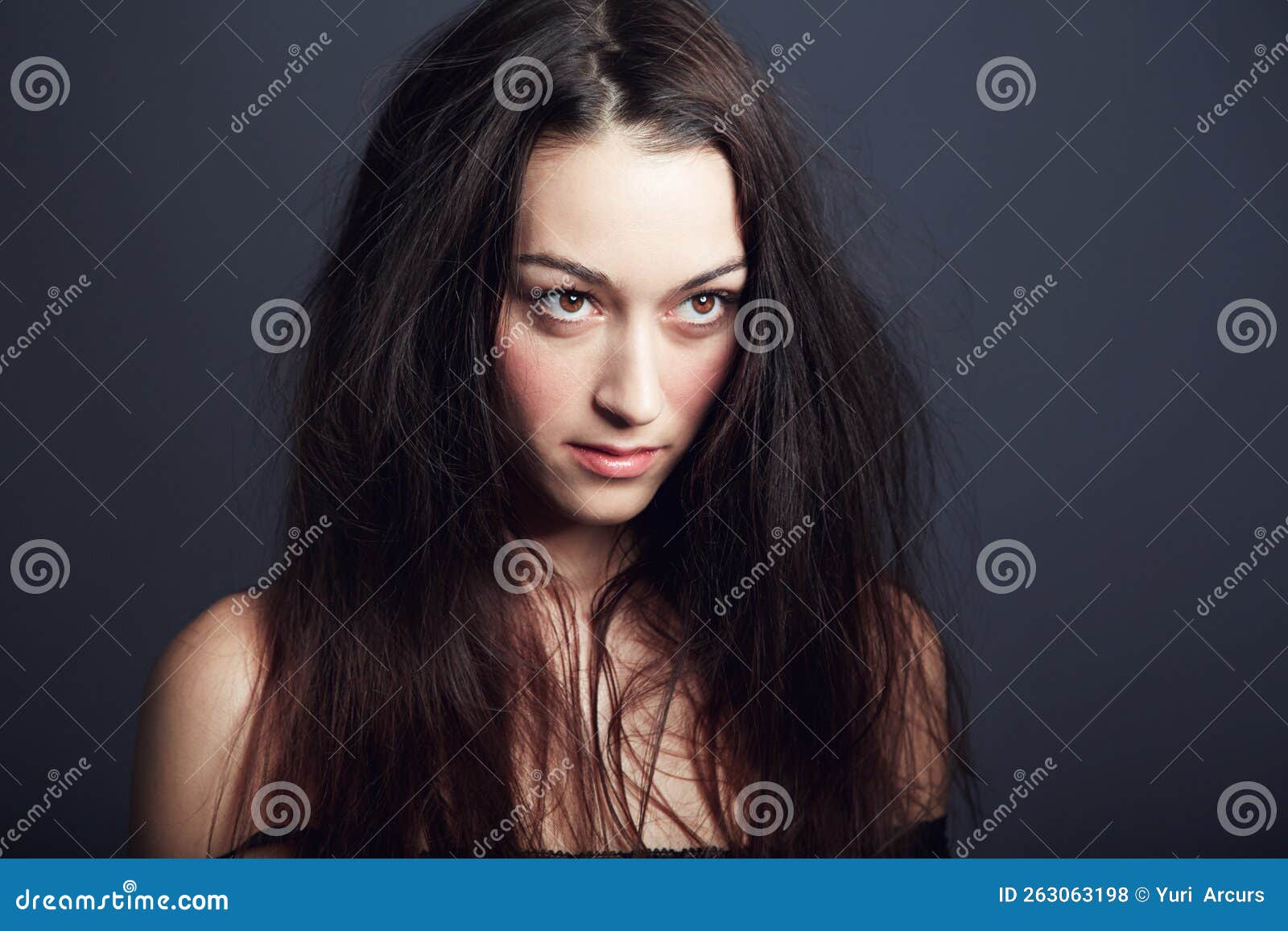 A Hypnotizing Stare. a Beautiful Brunette Looking Ahead of Her with a ...