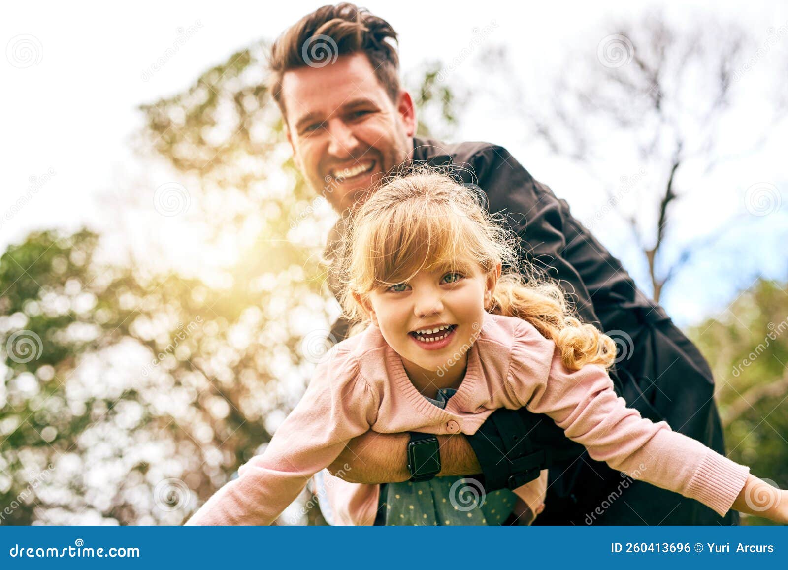 I Believe I Can Fly. a Father and Daughter Bonding Outside. Stock Photo ...