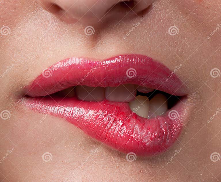 I bite the lip stock image. Image of macro, face, glamour - 22140979