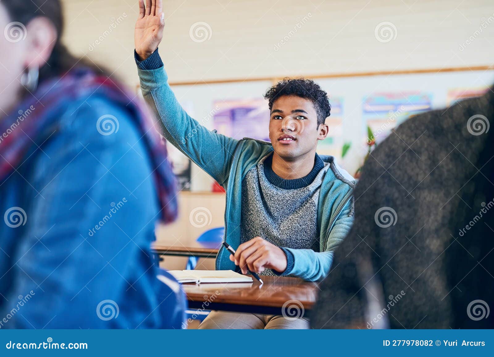 I Can Answer that. a Young Man Raising His Hand in Class. Stock Photo ...