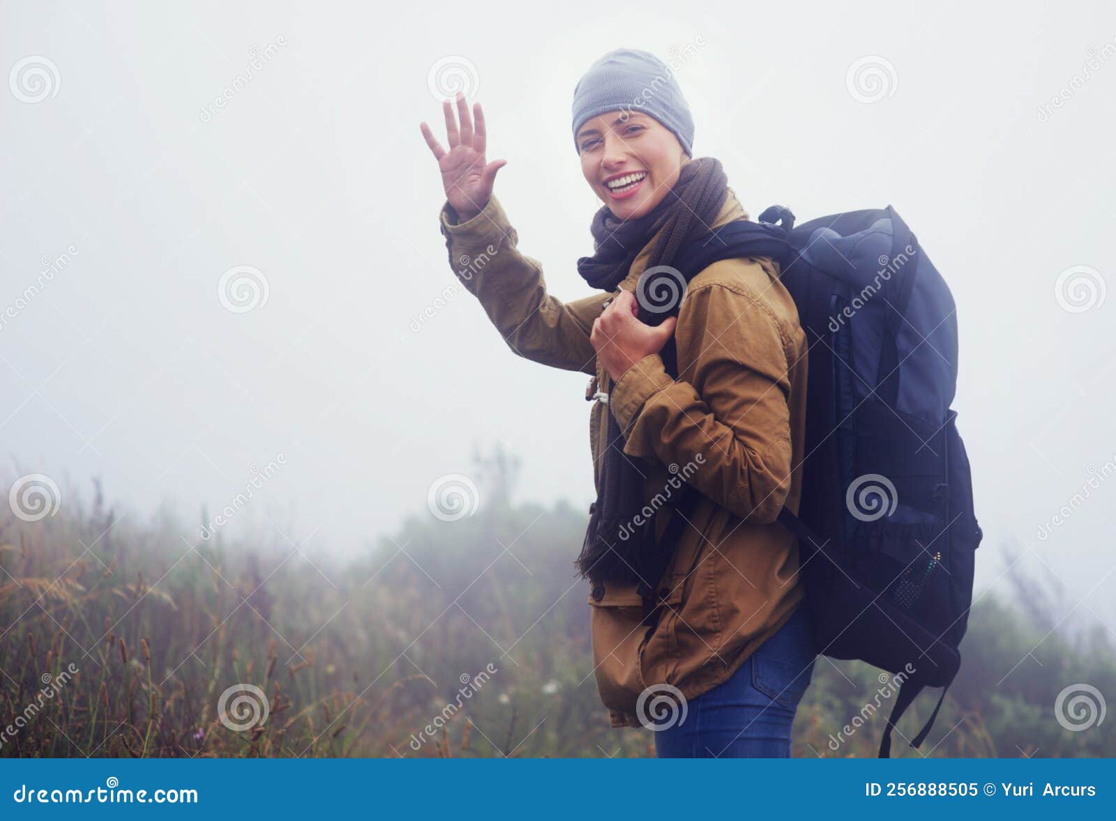 I Dare You To Keep Up With Me A Happy Young Female Hiker Waving At The